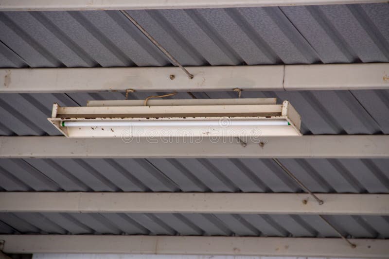 The Long Lamp that is Attached Above the Terrace is Made of Steel Frame ...