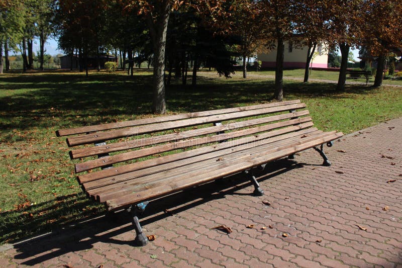 Long Large Park Bench on a Sunny Day. Arrangement of Parks Stock Image ...