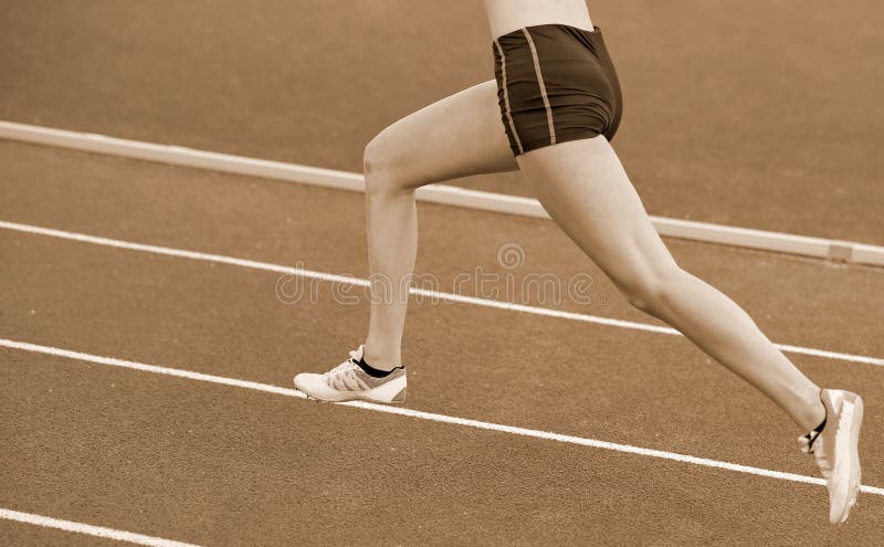 Runner Running on Athletic Track with Toned Sepia Stock Image - Image ...