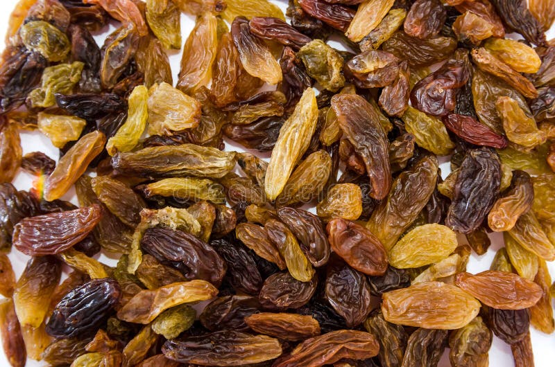 Raisins Background. Long Light Raisins on a White. Stock Image - Image ...