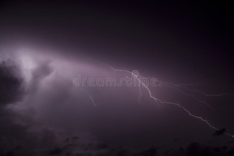 Long Lightning Bolt at Night Stock Photo - Image of lightning, powerful ...