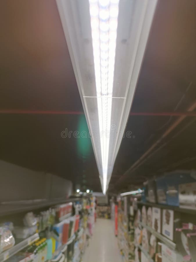Long Line of Ceiling Tube Lights Stock Image - Image of tube, large ...