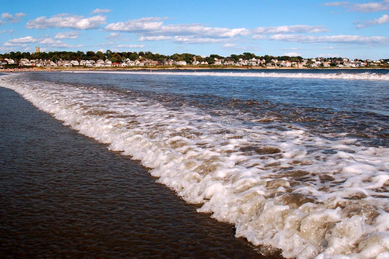 A Long Line of Waves Crash into the Shore Stock Image - Image of ...