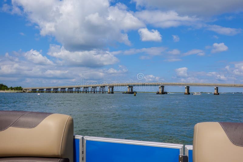Long Low Bridge Over a Bay Seen from the Back of a Boat Stock Image ...