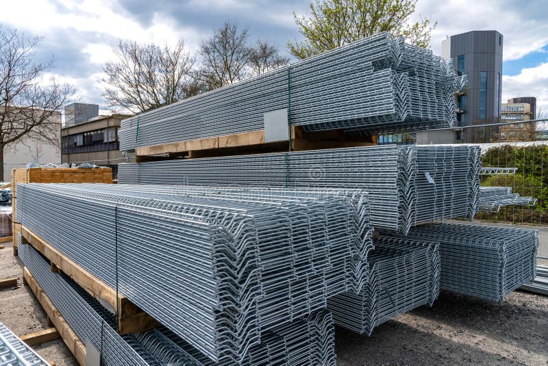 Long Metal Grating Stacked in Stacks at a Construction Site. Stock ...