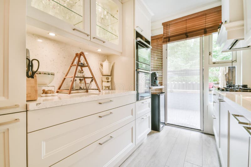 Long Narrow Kitchen with Kitchen Units Stock Photo - Image of design ...
