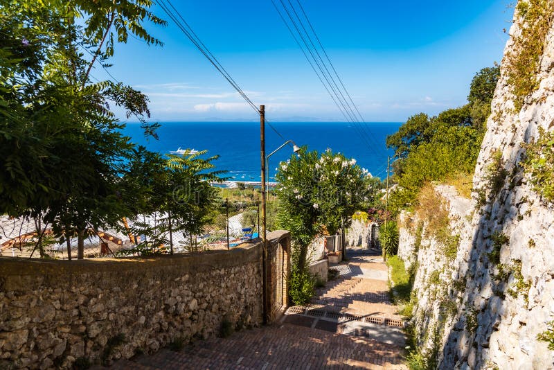 Long Narrow Path Full of Small Red Brick Steps Down To Bay of Capri ...