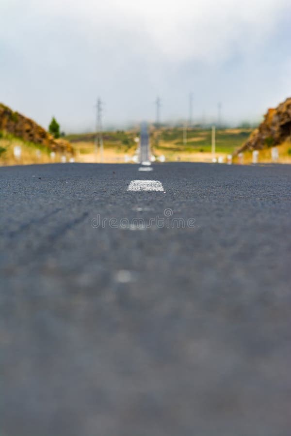 Long narrow road scenery stock image. Image of scenery - 79552313