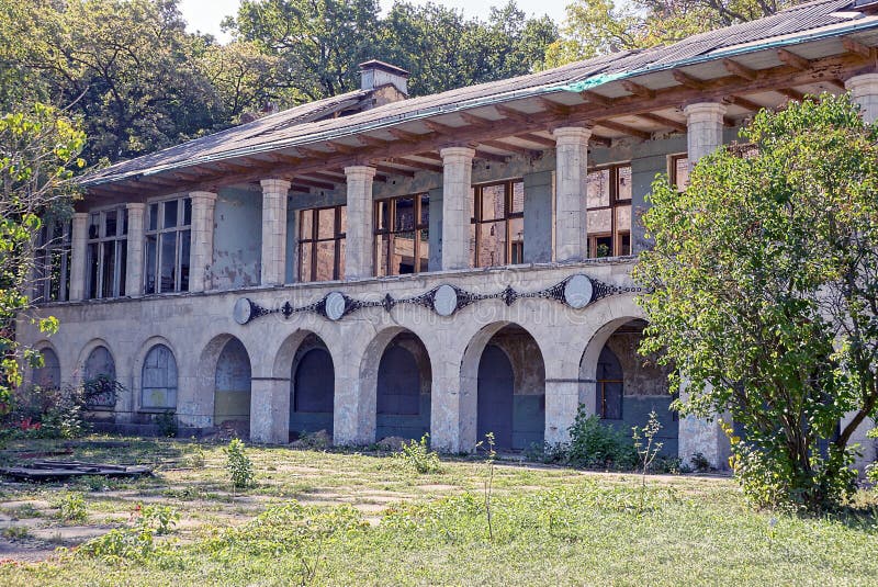 A Long Old Building with Windows and Concrete Columns Stock Photo ...