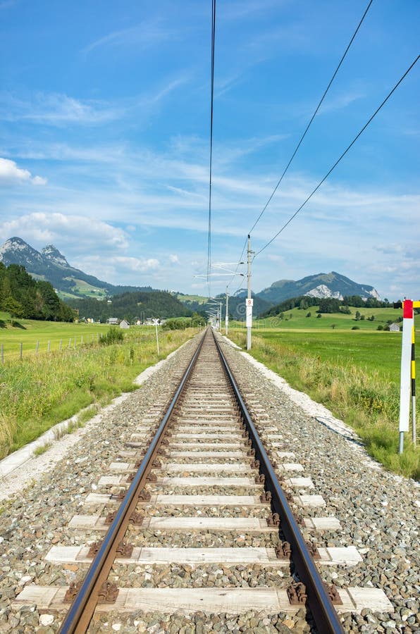 Long Railroad Against Beautiful Blue Cloudy Sky In Nature Stock Image ...