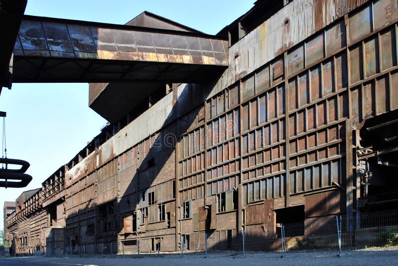 Rusty Factory Door and Smashed Glass Stock Photo - Image of moody ...
