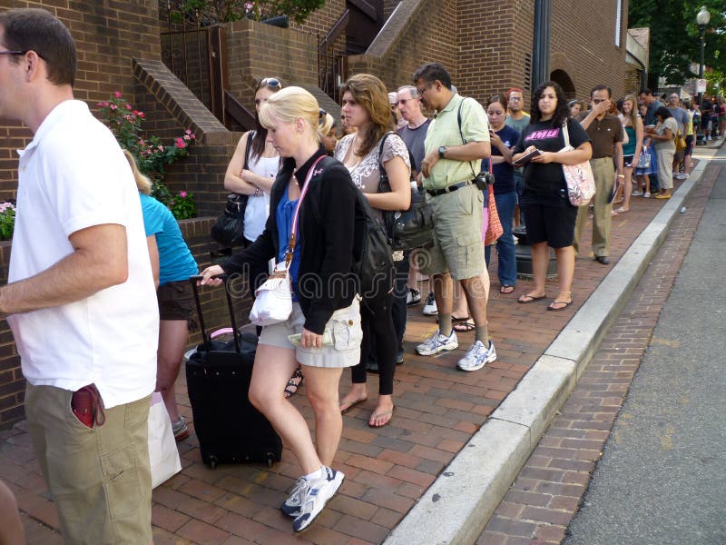 Long One Hour Line editorial photo. Image of sidewalk - 15415821