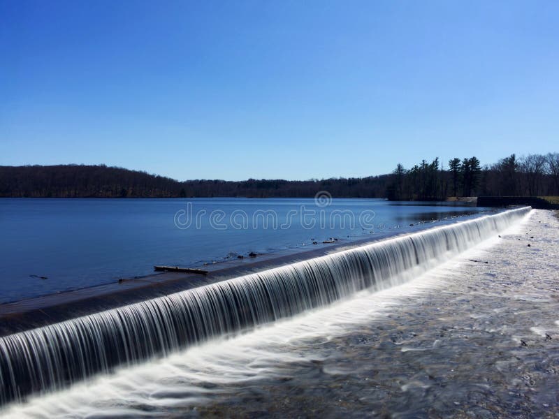 Long overflowing dam editorial photography. Image of created - 70711212