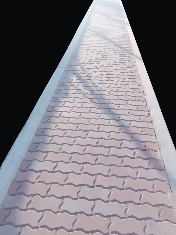 A Long Path of Brick Caterpillar Pattern Stock Image - Image of walkway ...