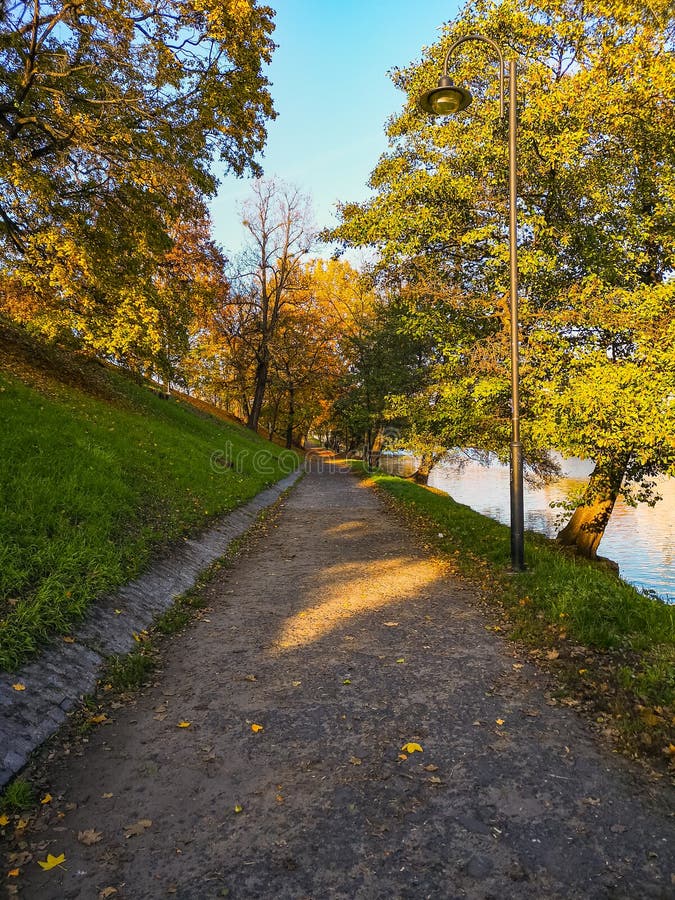 Long Path in Small Park Next To City Moat and Small Hill with Glimpses ...