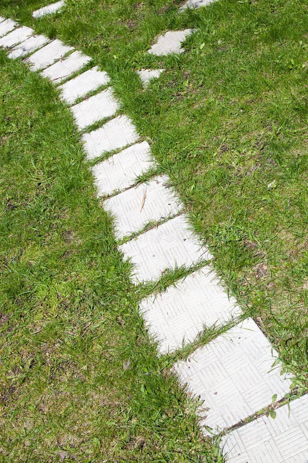 A Long Path of Tiles Across the Garden. Stock Image - Image of flora ...