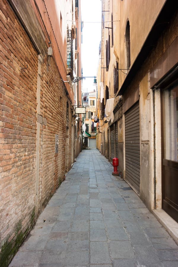 Long Pathway between the Old Brick Buildings Stock Photo - Image of ...