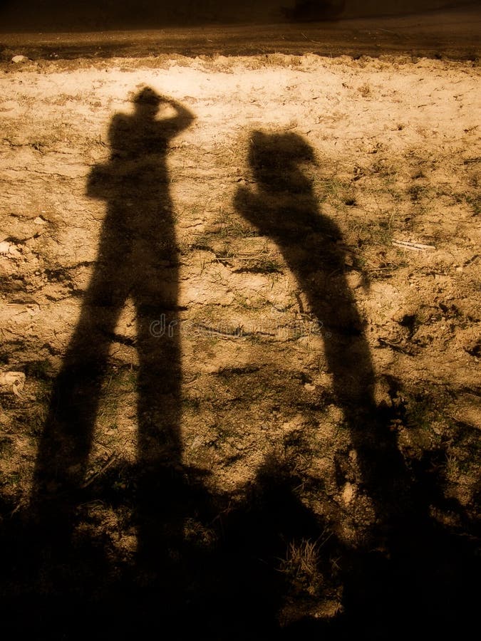 Long people shadows stock image. Image of sepia, long, beach - 502473