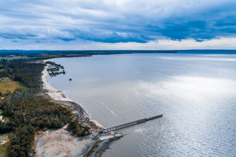 Long Pier and Ocean Coastline with Mangroves. Stock Photo - Image of ...