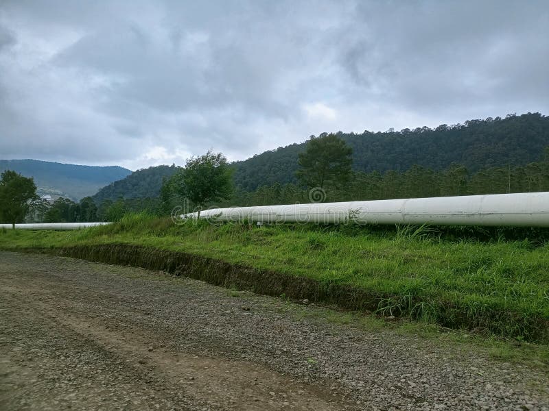 Long Pipe Over the Mountain Stock Image - Image of tree, agriculture ...