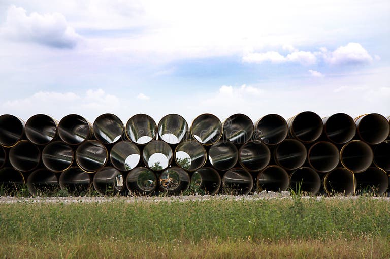 Long Pipe Stacked Next To Highway Stock Photo - Image of country, water ...