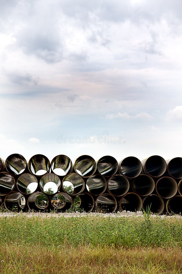 Long Pipe Stacked Next To Highway Stock Image - Image of workmen, work ...
