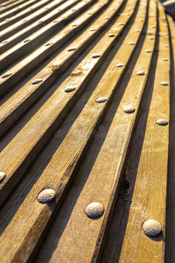 Long Planks Horizontal, Distant Perspective with Iron Rivets in the ...