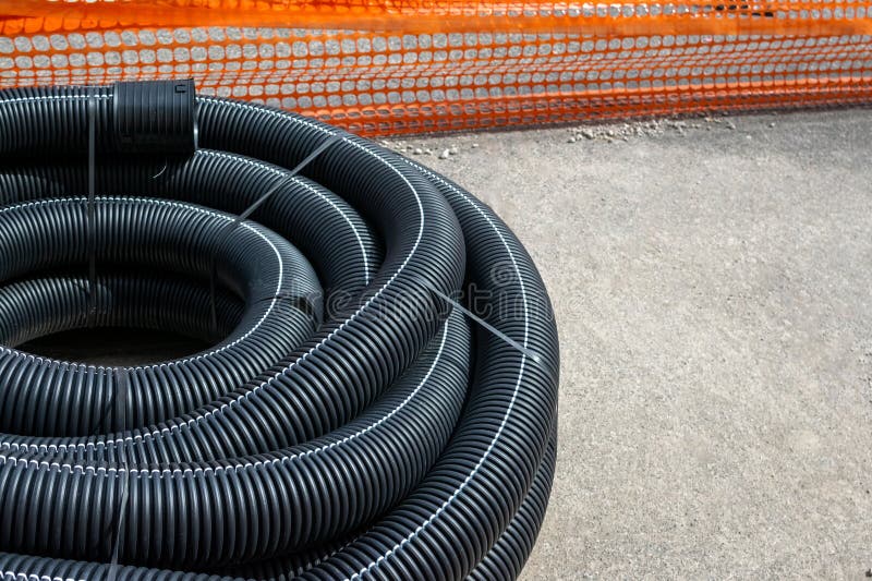 Long Plastic Tubes in Works Area for Remodeling Subsoil for Electrical ...