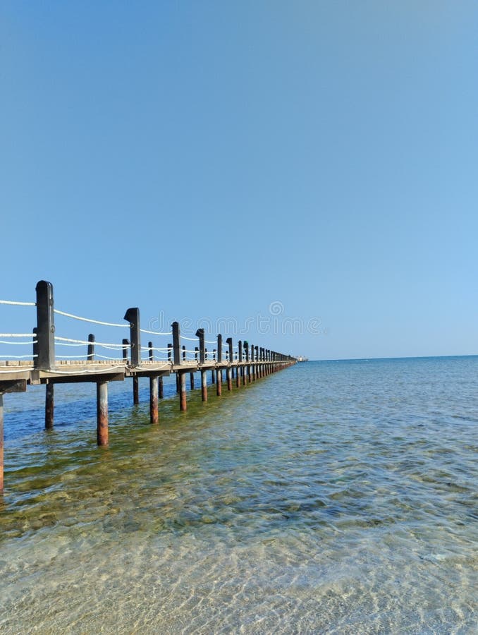 Long Pontoon Bridge Extending into the Sea, Open Sea, Sea Coast ...