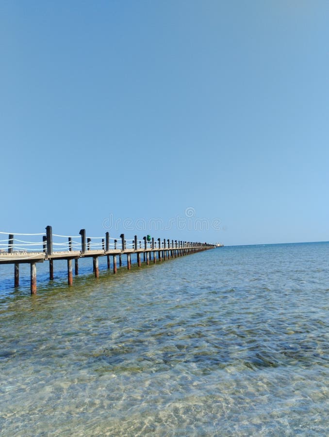 Long Pontoon Bridge Extending into the Sea, Open Sea, Sea Coast ...