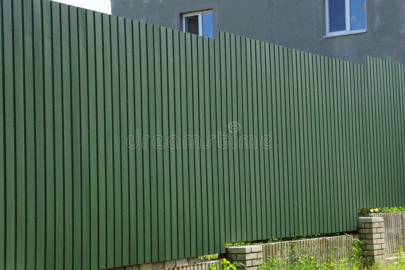 Long Private Green Metal Fence Outside Stock Photo - Image of greens ...