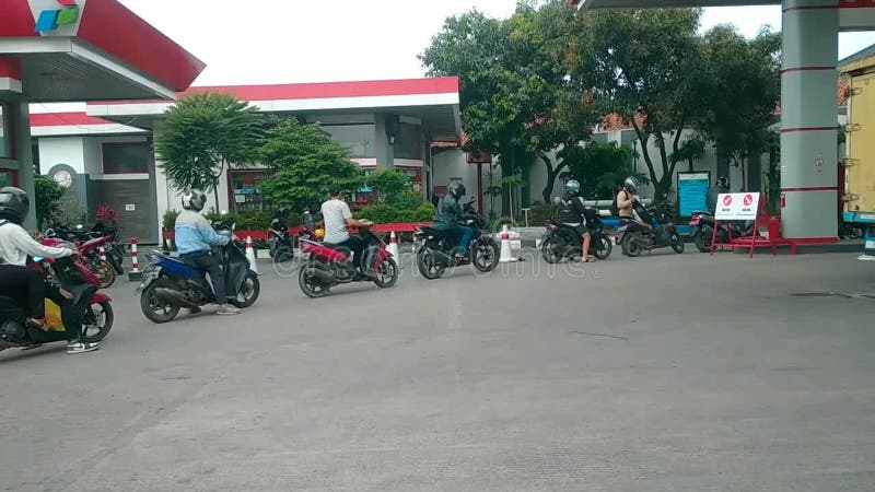 Long Queue of Motorbikes at Gas Stations Stock Footage - Video of ...