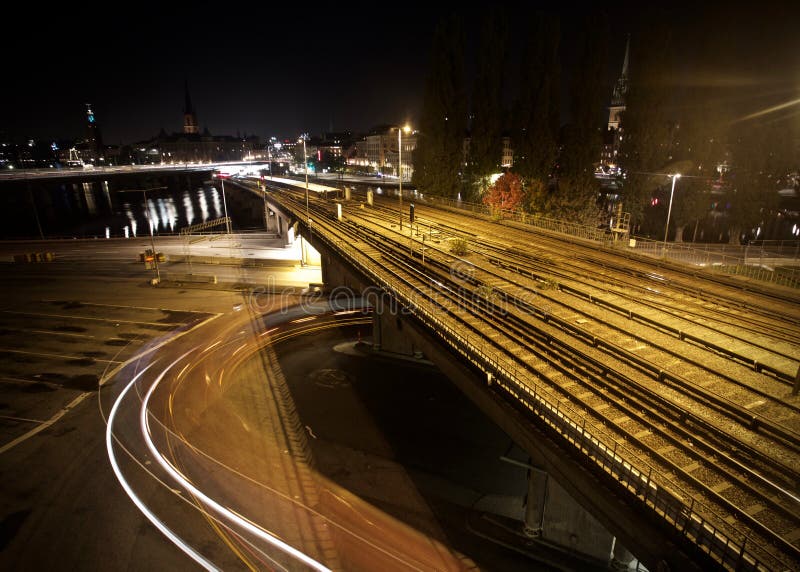 Long rail at night stock image. Image of traffic, illuminated - 73055167