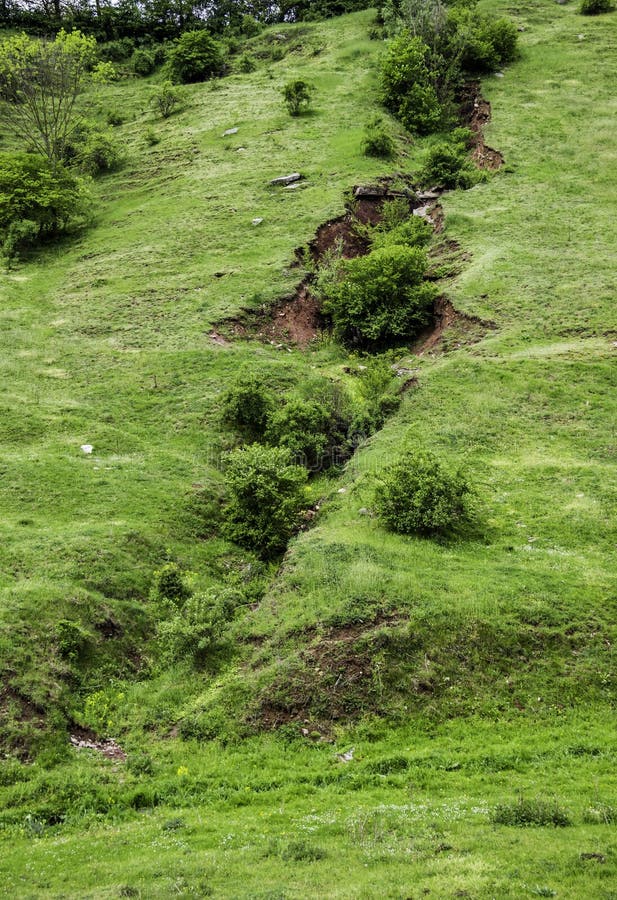 Long ravine on the hill stock photo. Image of spring - 253570006