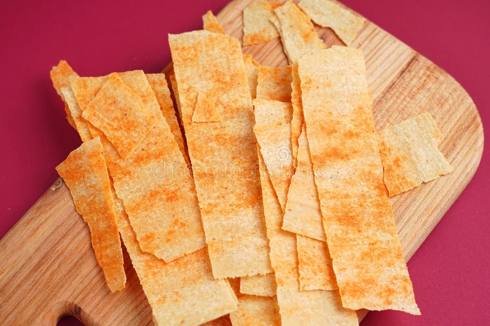 Long Rectangular Chips on a Bright Pink Background Stock Image - Image ...