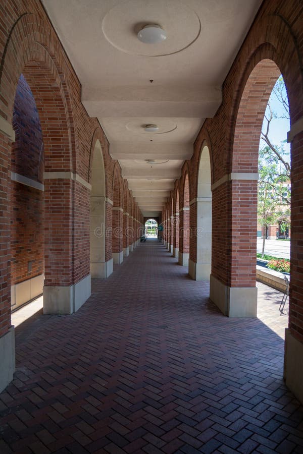 Long Red Brick Arch Corridor at a University Editorial Stock Image ...