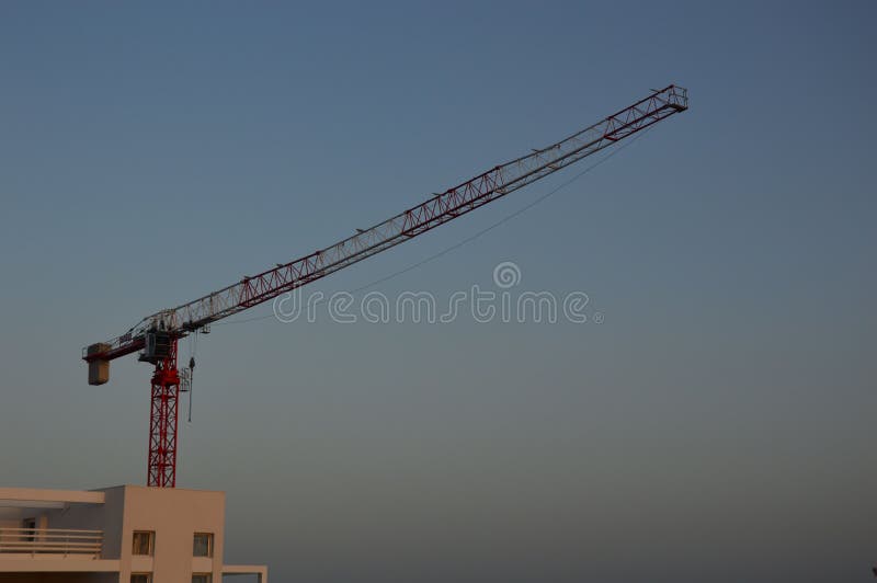 Long Red Crane Agains a Blue Sky Stock Photo - Image of construction ...