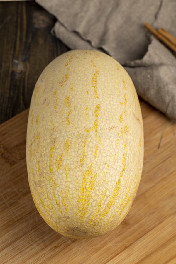 Long Ripe Yellow Melon on the Table Stock Image - Image of dessert ...