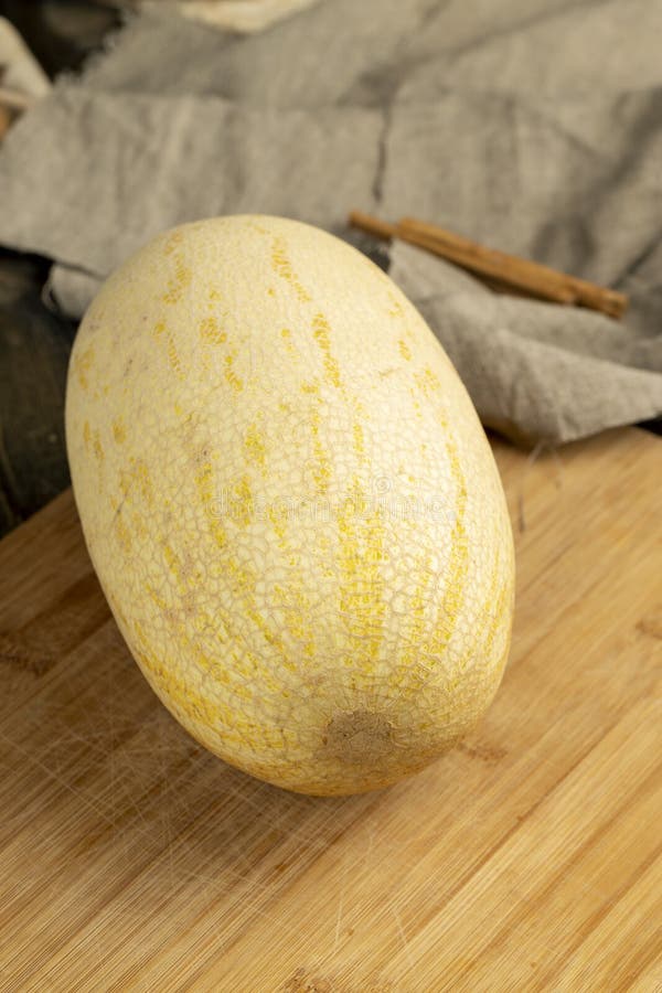 Long Ripe Yellow Melon on the Table Stock Image - Image of bright ...