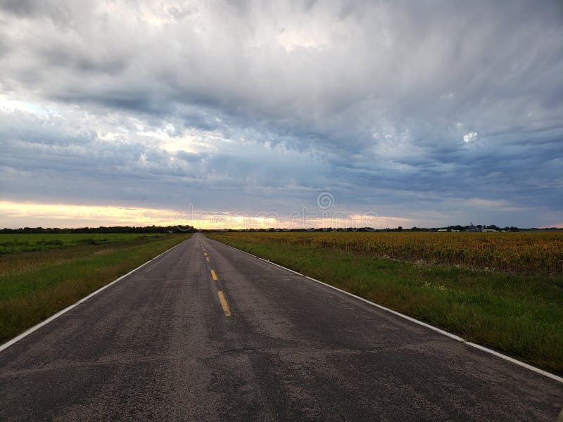 A Long Road Ahead stock photo. Image of grass, highway - 238509528