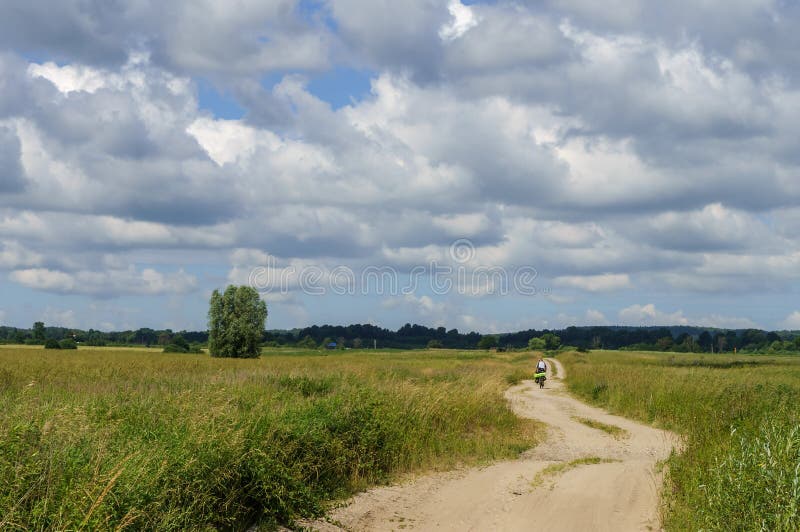A Long Road in an Arable Field. Farmland. a Beautiful Field Road Stock ...