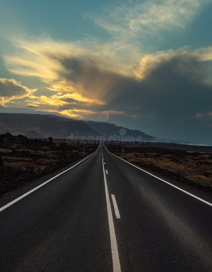 A Long Road with Could Golden Hour Stock Photo - Image of horizon ...