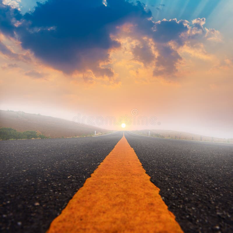 Long Road and Sunset with Sun Rays Stock Photo - Image of light, sunset ...