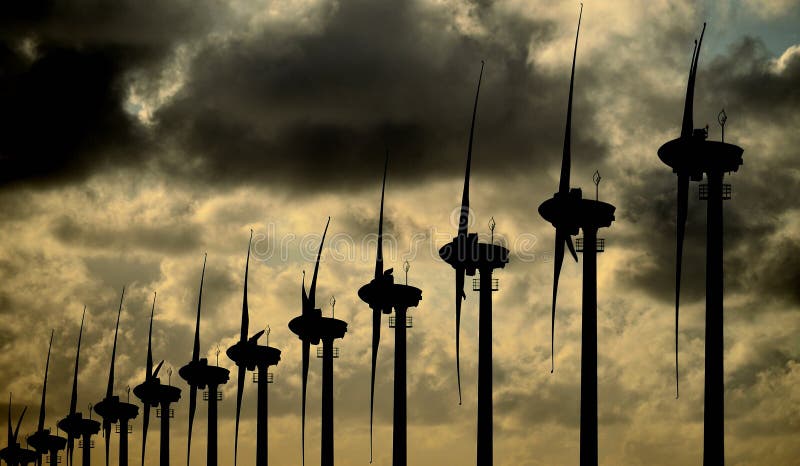 Long Row of Backlit Wind Turbines at Dawn Stock Photo - Image of ...