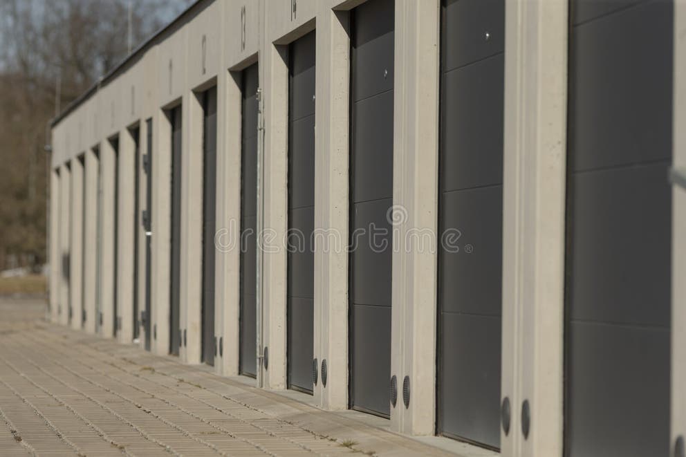 A Long Row of Lockers is Neatly Lined Up on the Side of a Building ...