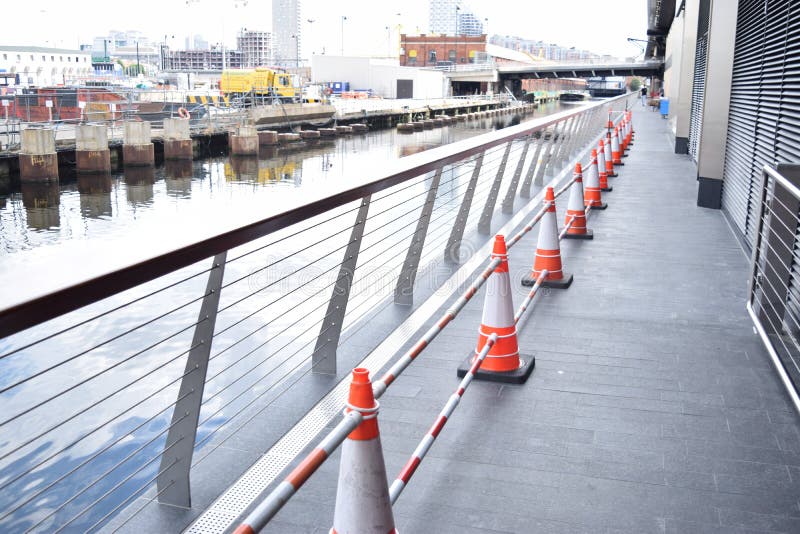 Long Row of Orange Cones on a Bridge Stock Photo - Image of bridge ...