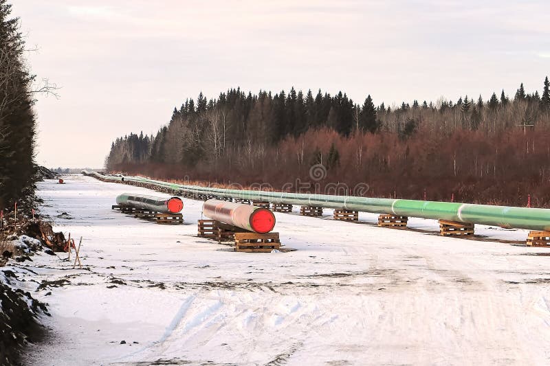 A Long Row of Pipeline Being Pieced Together Stock Photo - Image of ...
