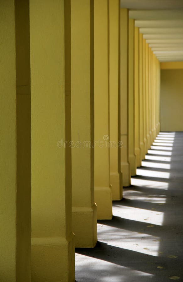 Long row of yellow columns stock photo. Image of yellow - 61114026