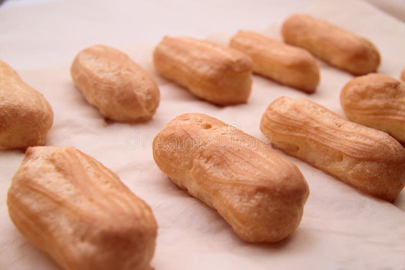 Long Rows Eclair Shells. Eclairs Candy Paper. the Process of Making ...