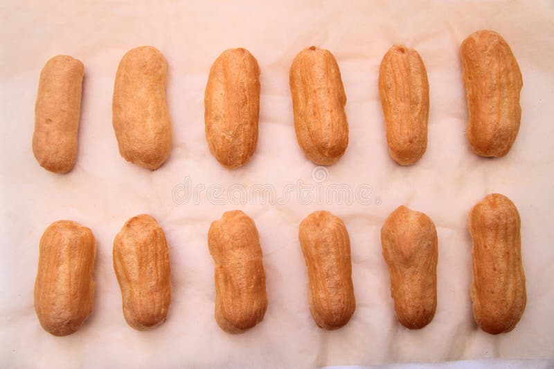 Long Rows Eclair Shells. Eclairs Candy Paper. the Process of Making ...
